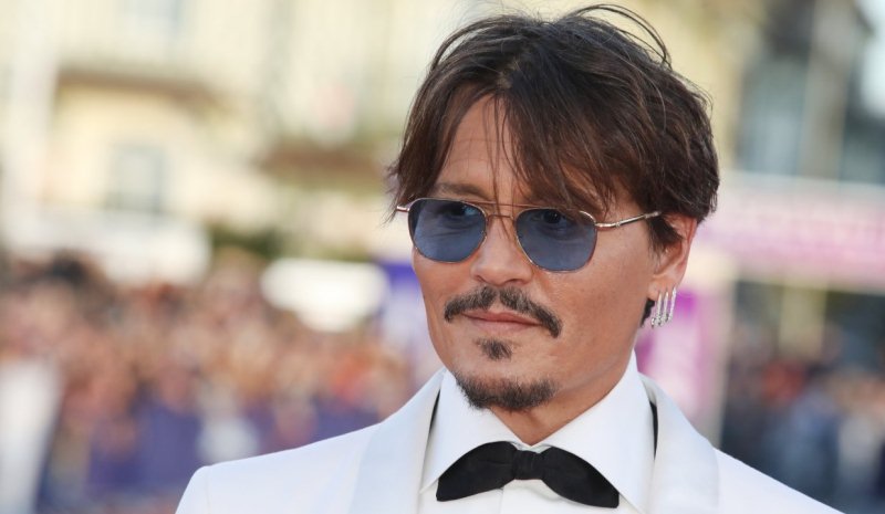 Johnny Depp 'Not a Wife Beater' and Amber Hea| Kataeb | Kataeb